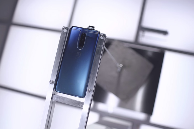 OnePlus 7 Pro's Pop-up Camera Can Hold a 22kg Slab of Cement Without ...